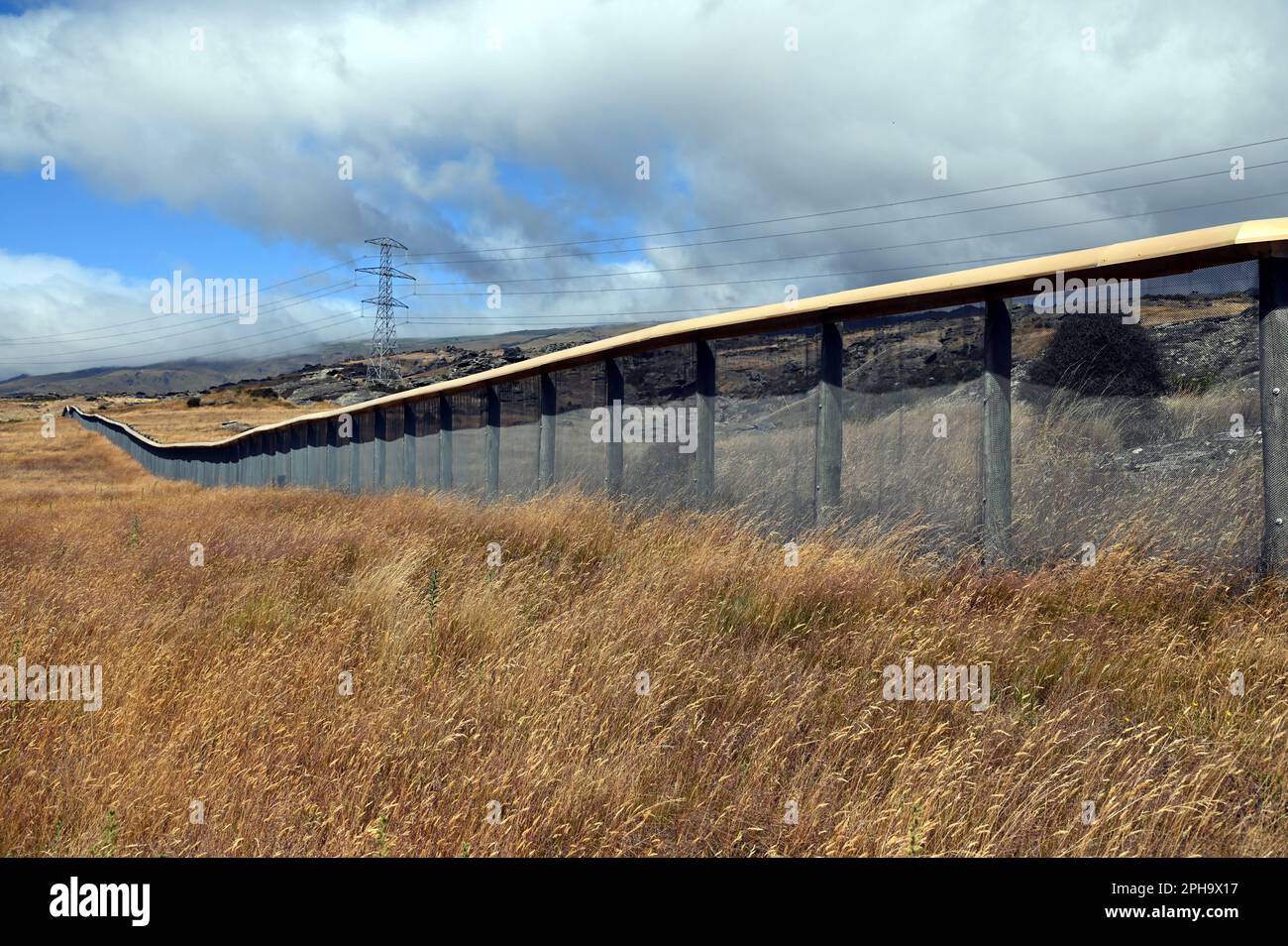 A large fence surrounding the Mokomoko Dryland Sanctuaryin Central ...