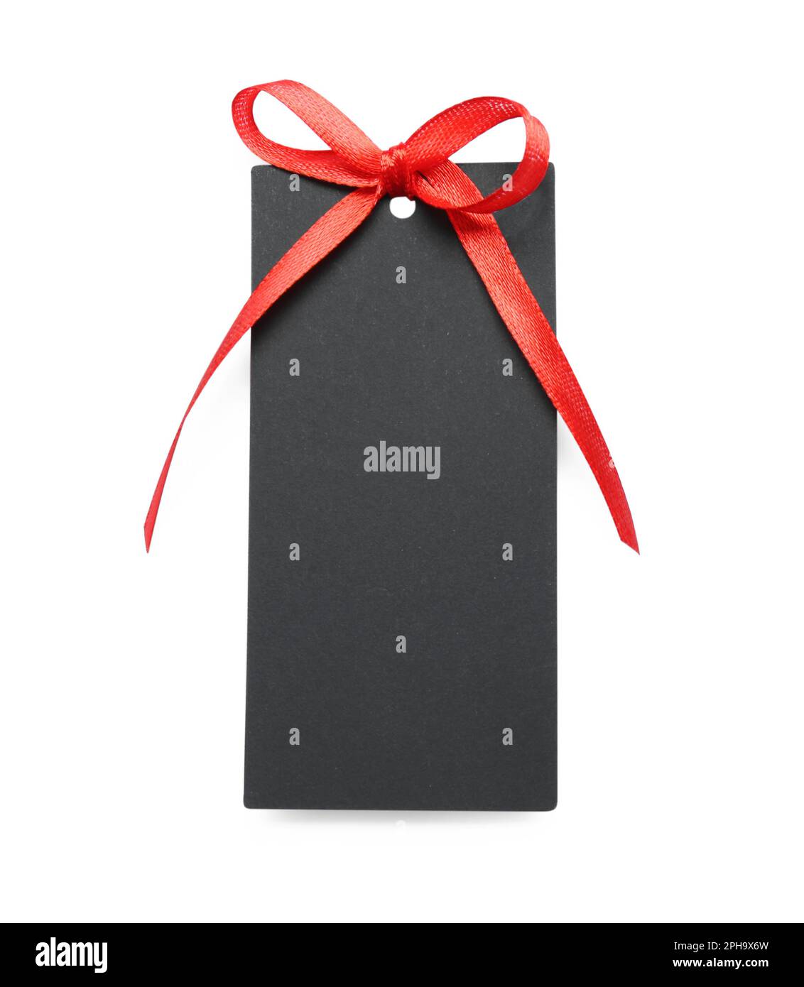 Blank black gift tag with red satin ribbon on white background, top ...