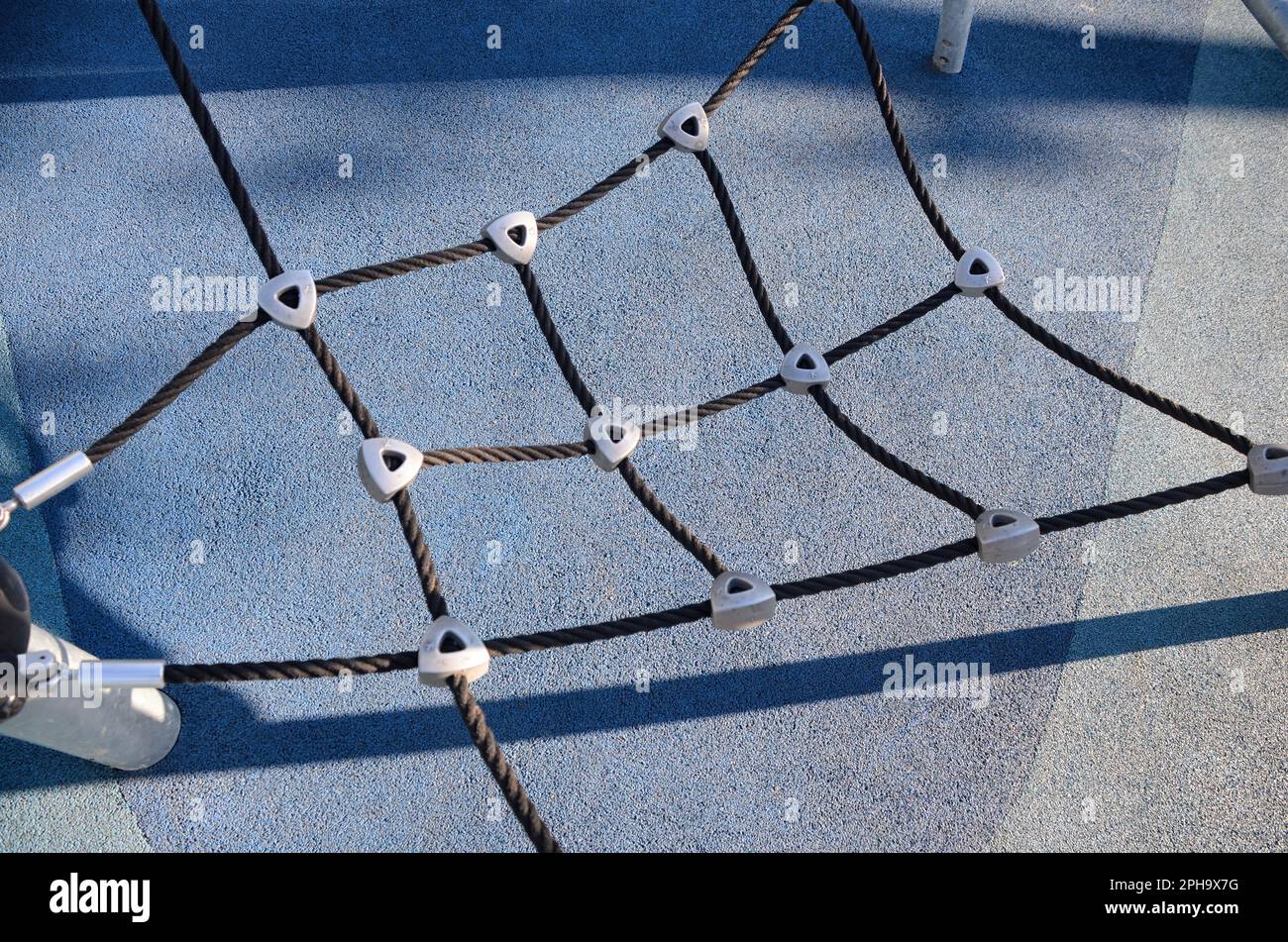 Climbing ropes at kids playground, climbing net, ropes in the ...