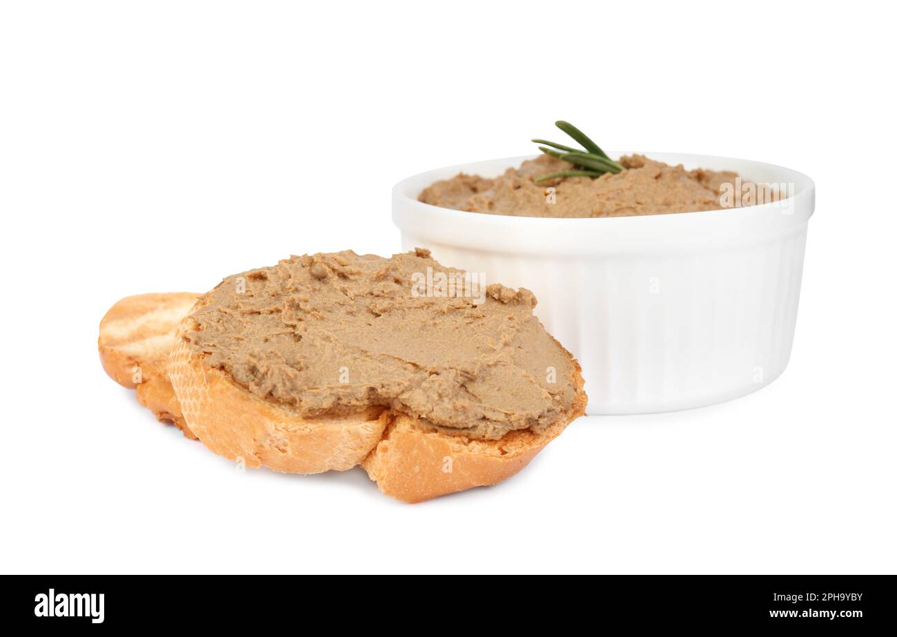 Fresh bread and bowl with delicious liver pate on white background ...