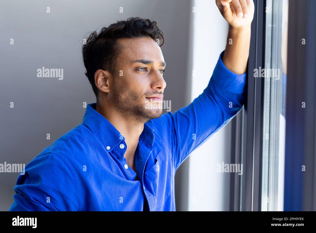 Leaning out the house window hi-res stock photography and images - Alamy