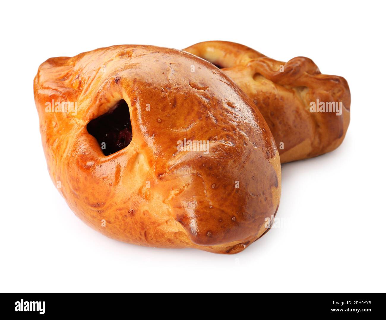 Two delicious baked patties with filling on white background Stock ...