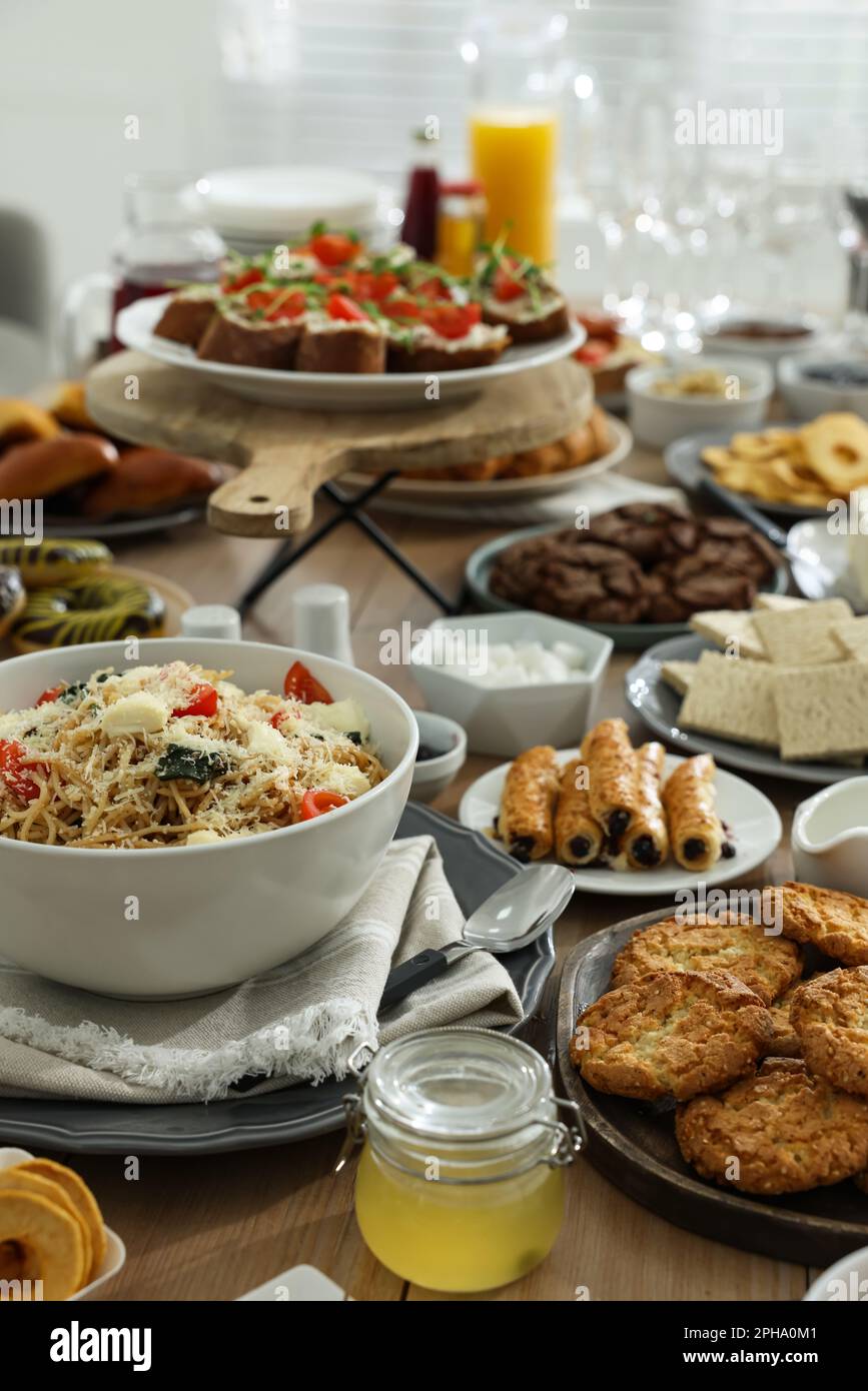 Brunch table setting with different delicious food indoors Stock Photo ...