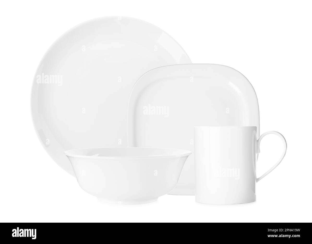 Set of beautiful ceramic dinnerware on white background Stock Photo - Alamy
