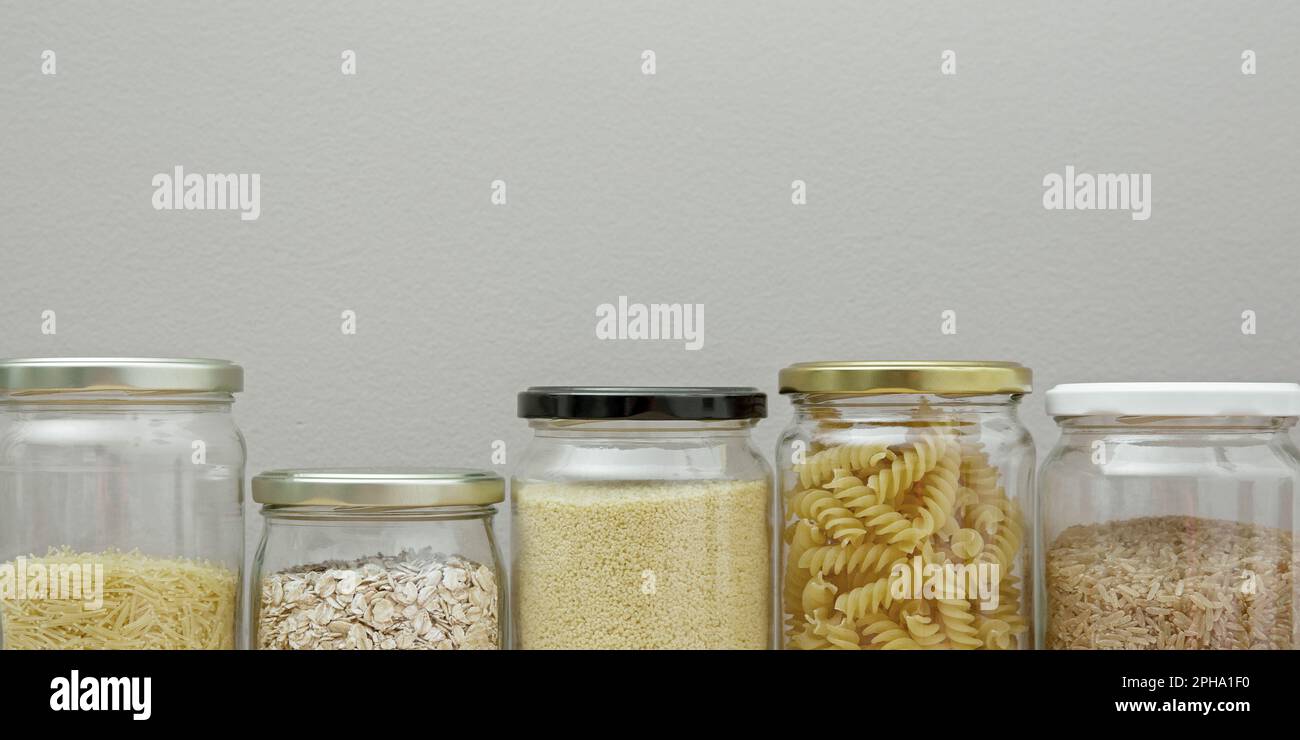 Variety of legumes and grains in glass jars. Concept of zero waste and ...