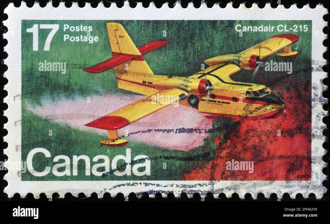 Canadair in action on canadian postage stamp Stock Photo - Alamy