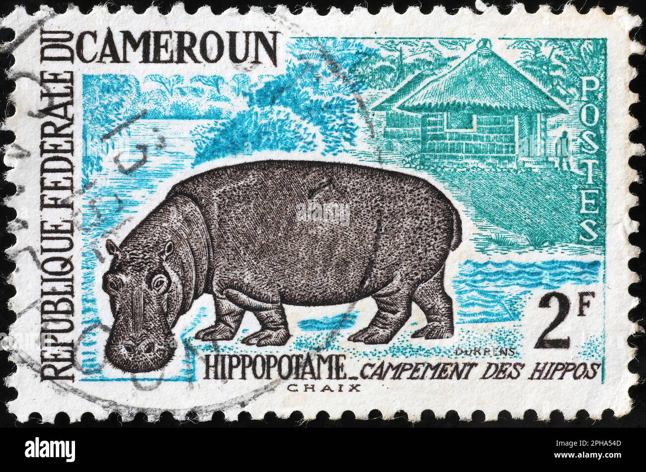 Hippopotamus on old stamp of Cameroon Stock Photo - Alamy