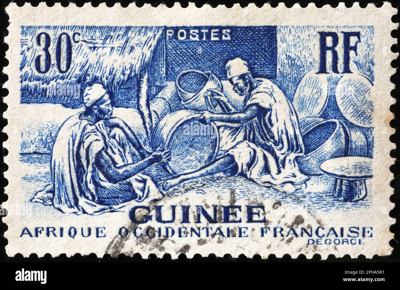 Men making wicker baskets on vintage african stamp Stock Photo - Alamy