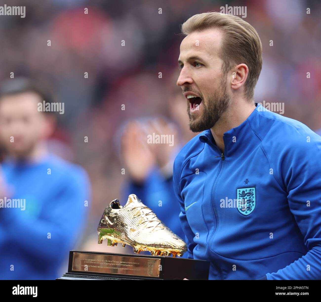 Harry Kane of England poses with their Golden Boot trophy during UEFA ...