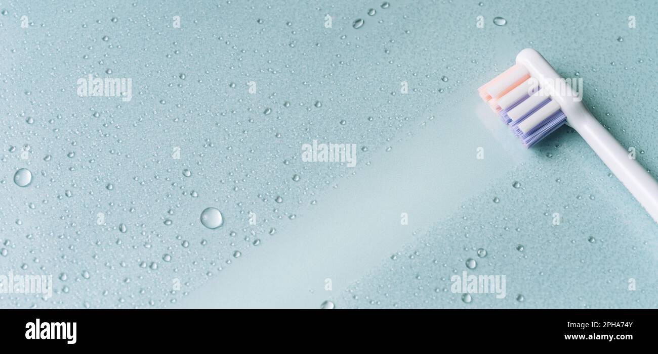 Dry and clean toothbrush marks on a glass surface Stock Photo - Alamy