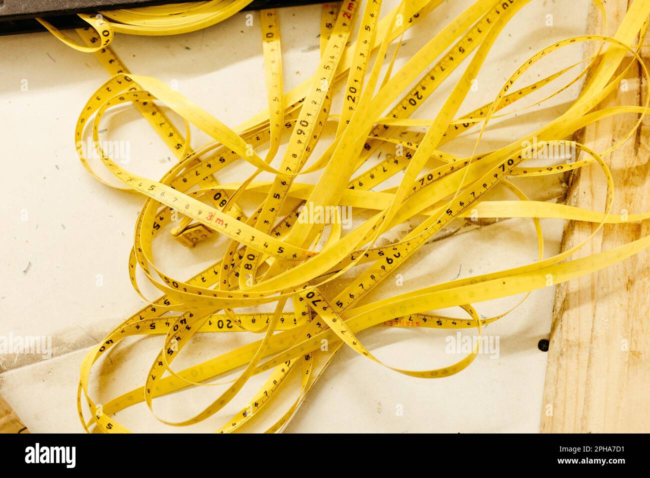 Closeup yellow measuring tape hi-res stock photography and images - Alamy