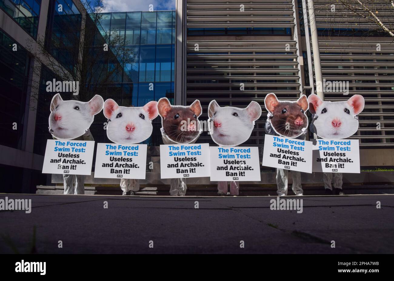 London, UK. 27th March 2023. PETA activists with huge mouse and rat ...