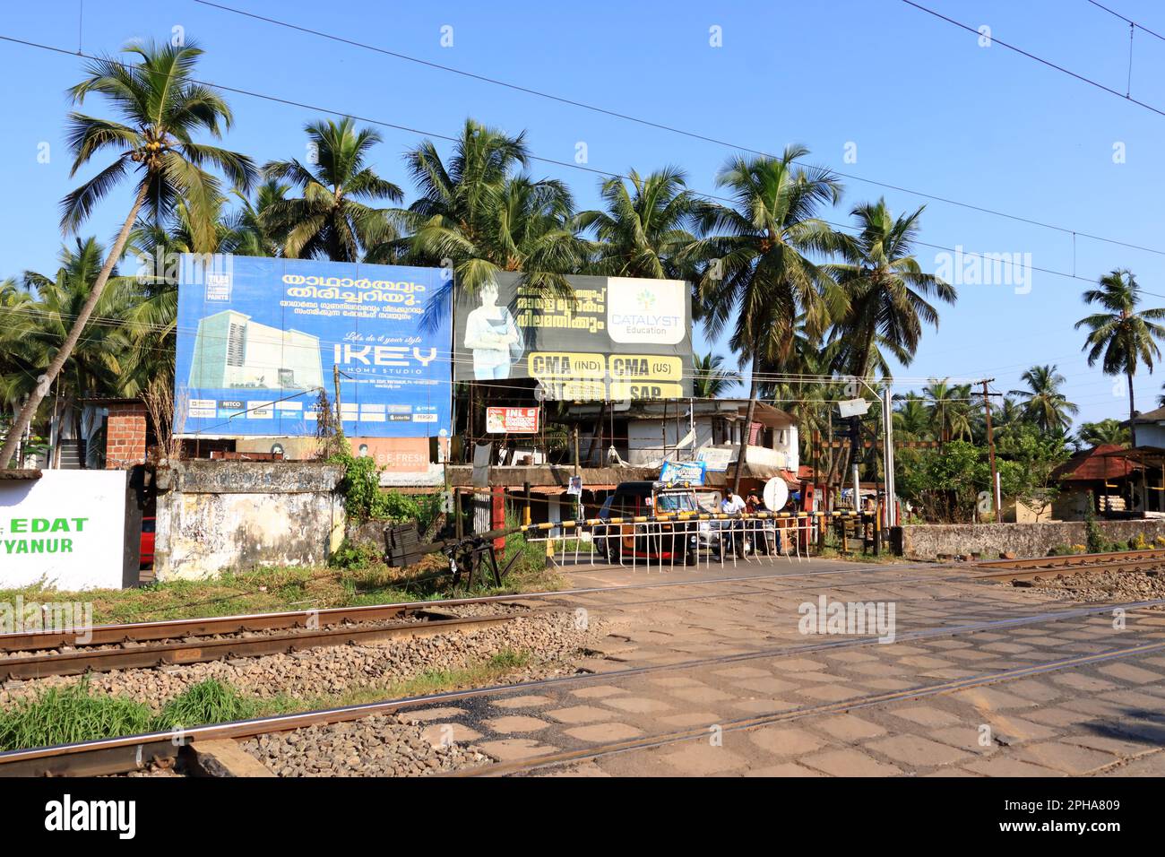December 28 2022 - Kannur, Kerala in India: Railroad crossing in India Stock Photo - Alamy