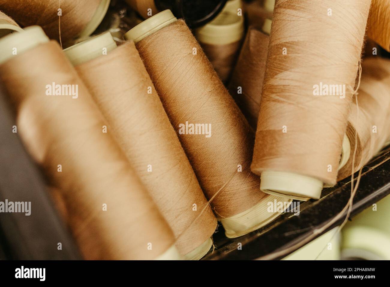 Linen yarn spooling hi-res stock photography and images - Alamy