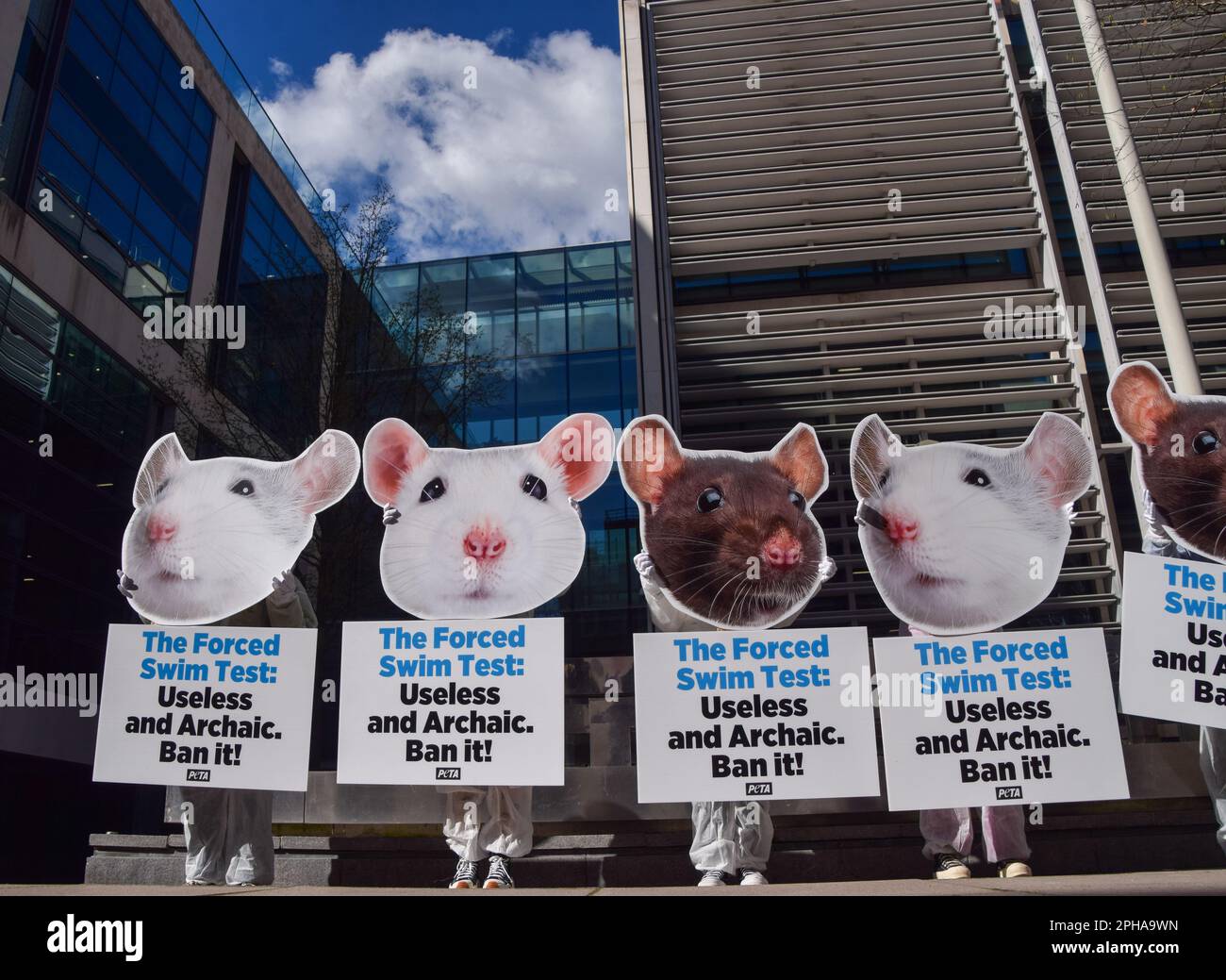 London, UK. 27th March 2023. PETA activists with huge mouse and rat ...