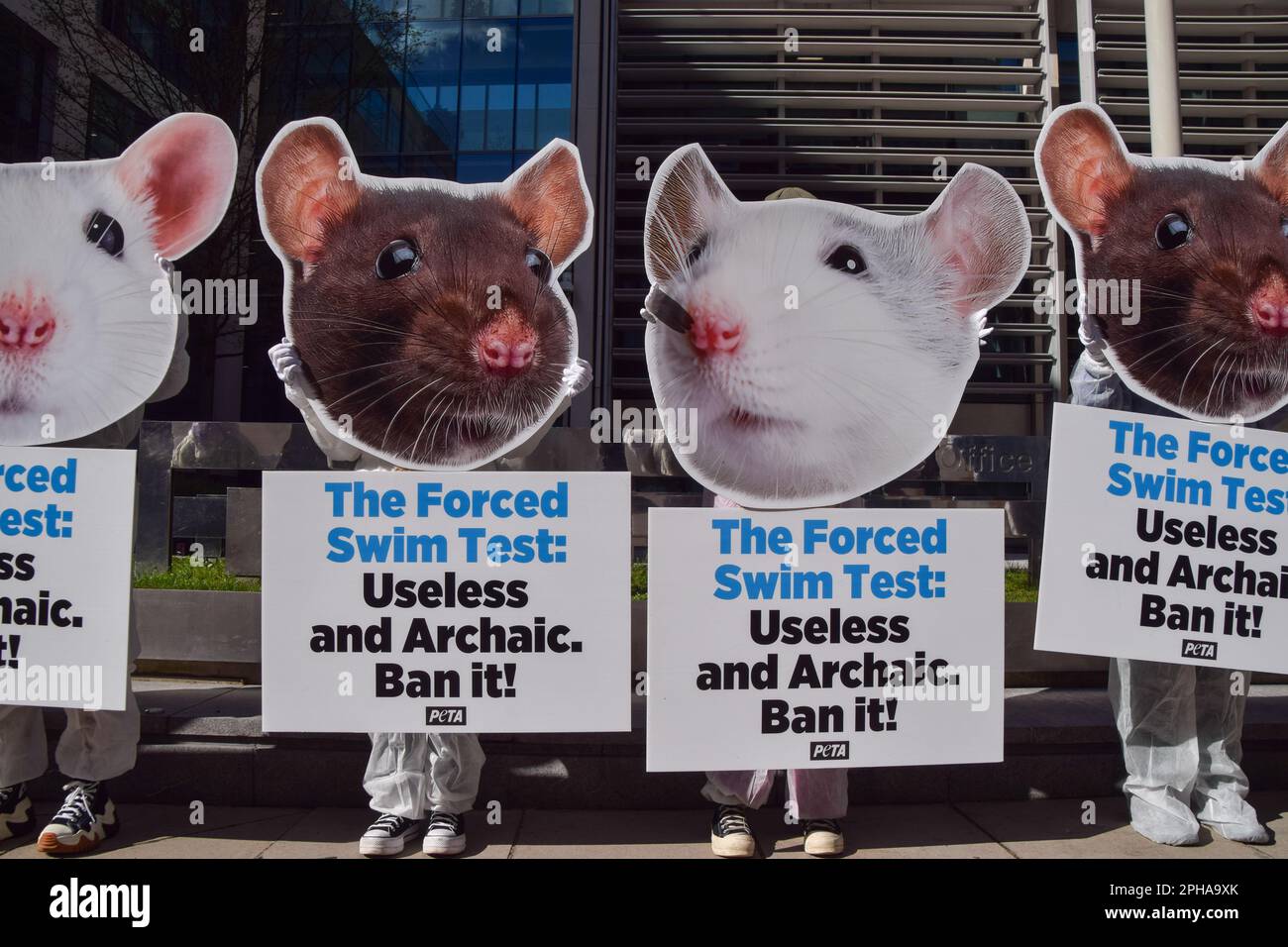 London, UK. 27th March 2023. PETA activists with huge mouse and rat ...