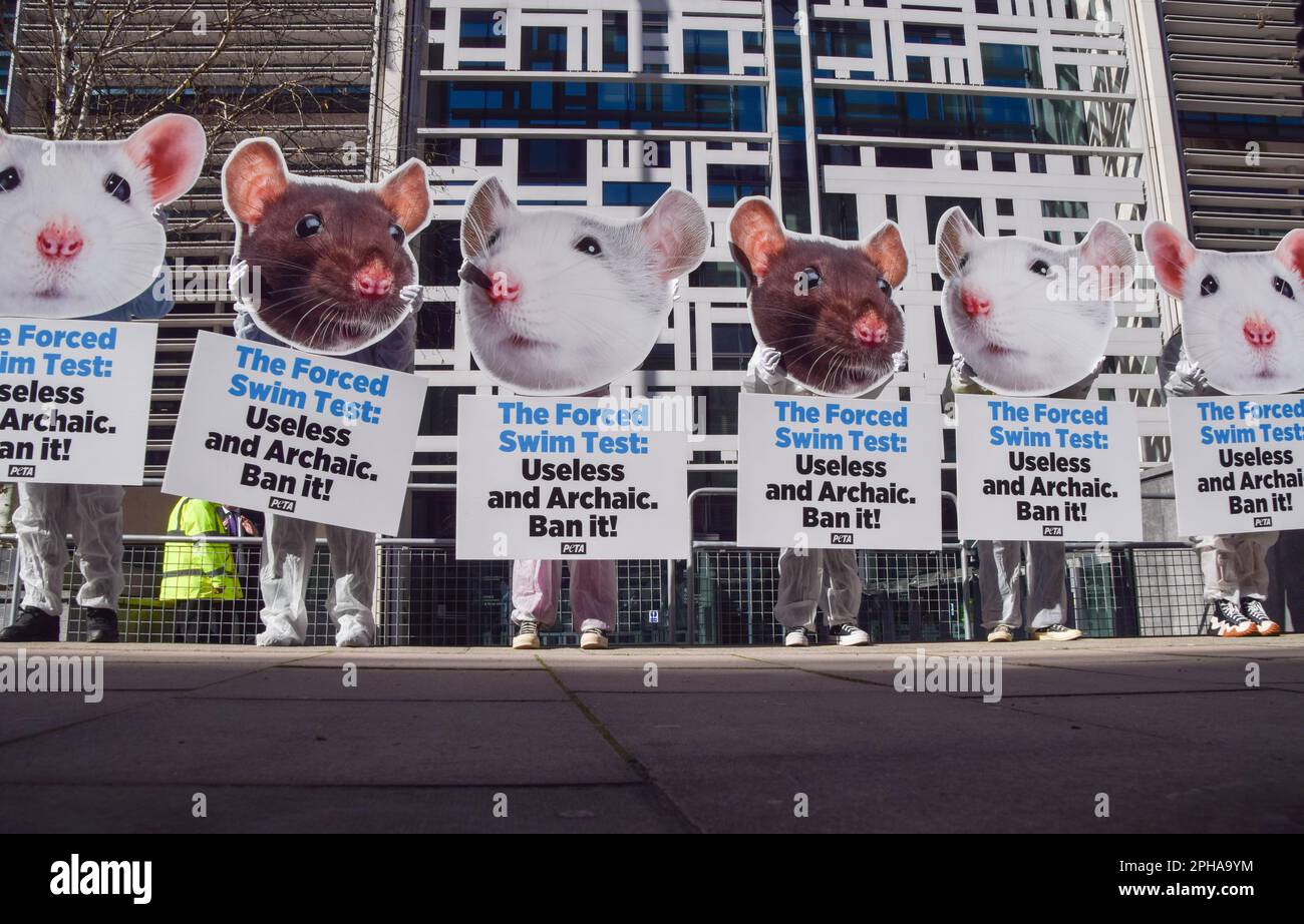 London, UK. 27th March 2023. PETA activists with huge mouse and rat ...