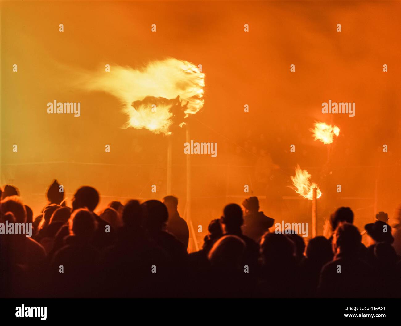 A crowd watching bonfire at night Stock Photo - Alamy
