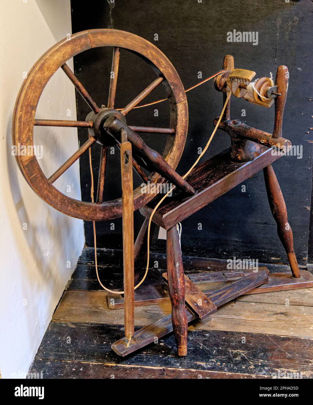 Antique spinning wheel. Nice ancient wooden spinning wheel at Tudor ...