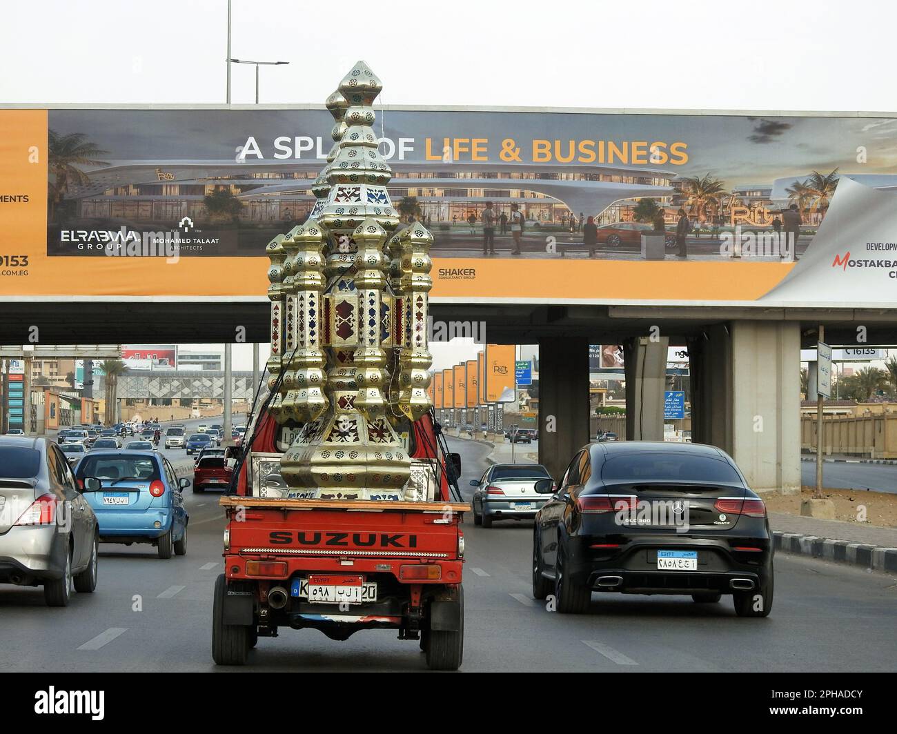 Cairo, Egypt, March 23 2023: A car transporting large Fanous lantern ...