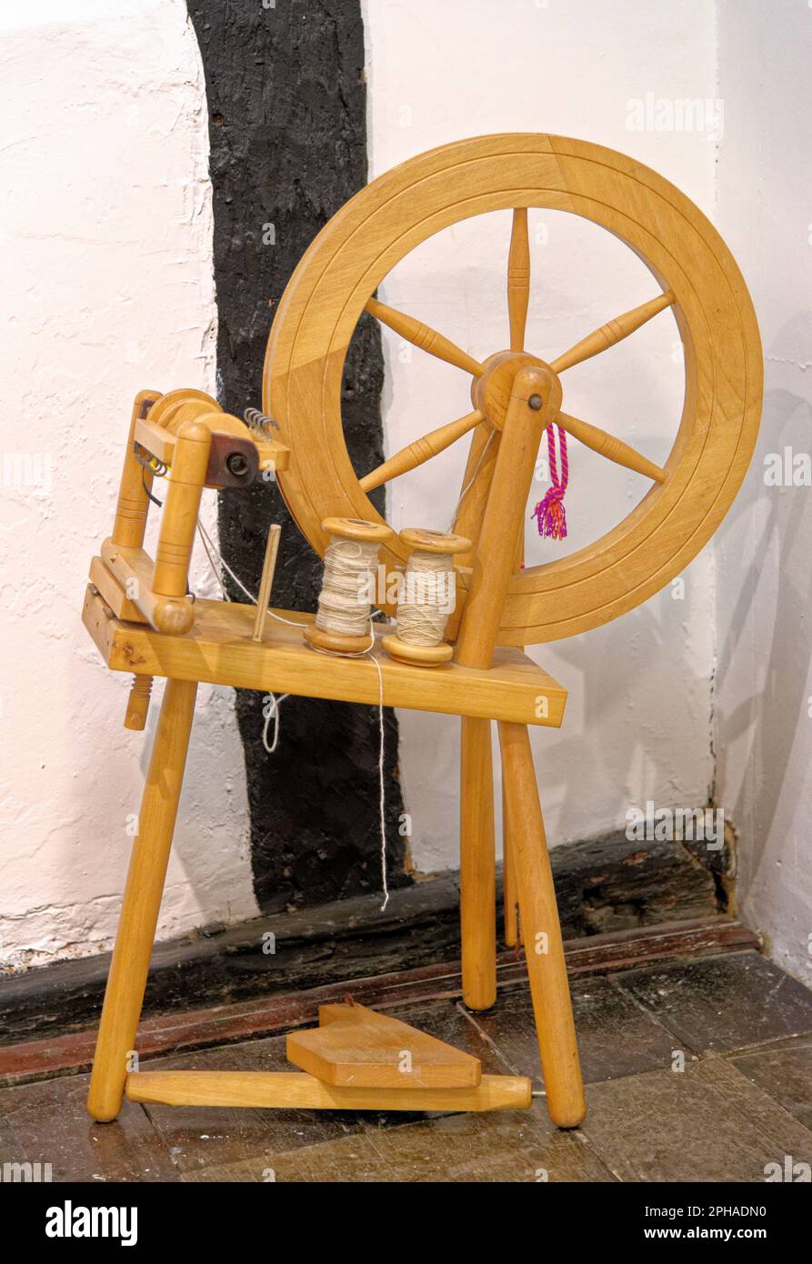 Antique spinning wheel. Nice ancient wooden spinning wheel at Tudor ...