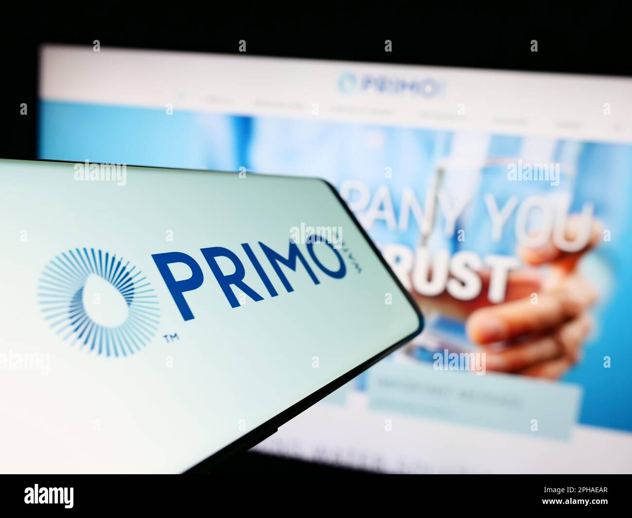 Smartphone with logo of company Primo Water Corporation on screen in ...