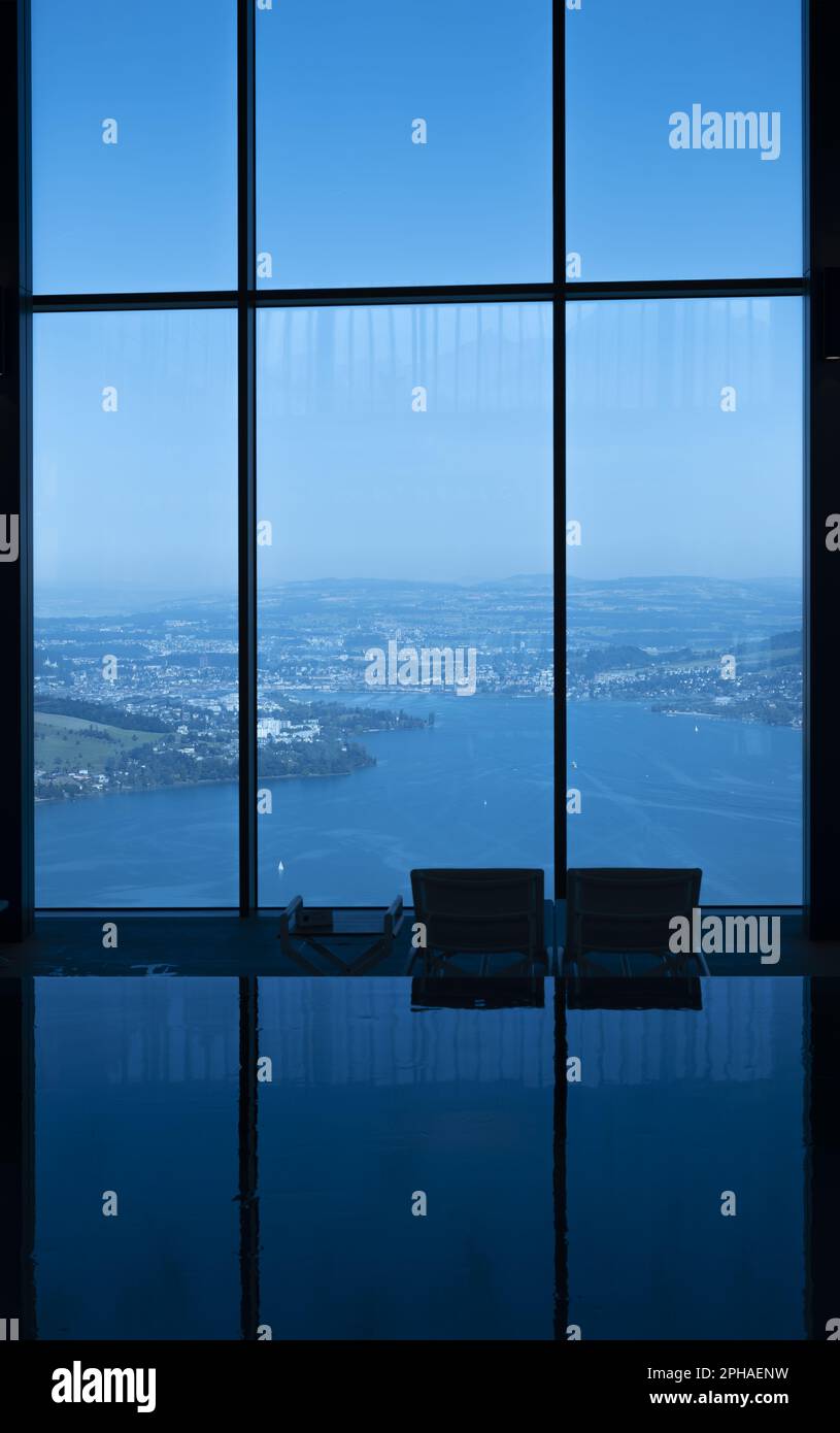 Infinity Swimming Pool with Window View over City and Lake Lucerne in ...