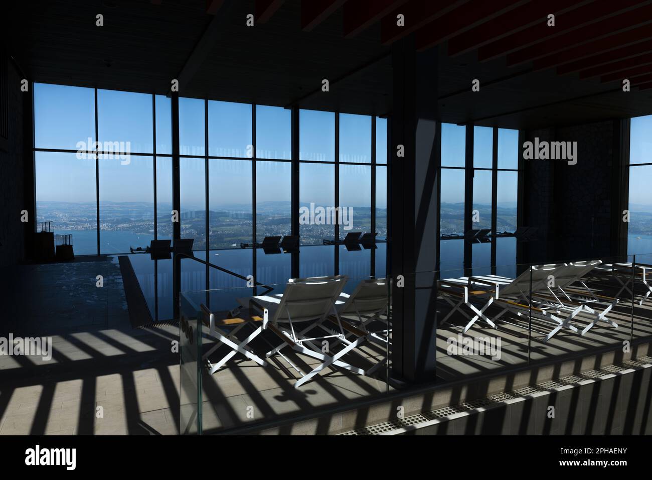 Infinity Swimming Pool with Window View over City and Lake Lucerne in ...
