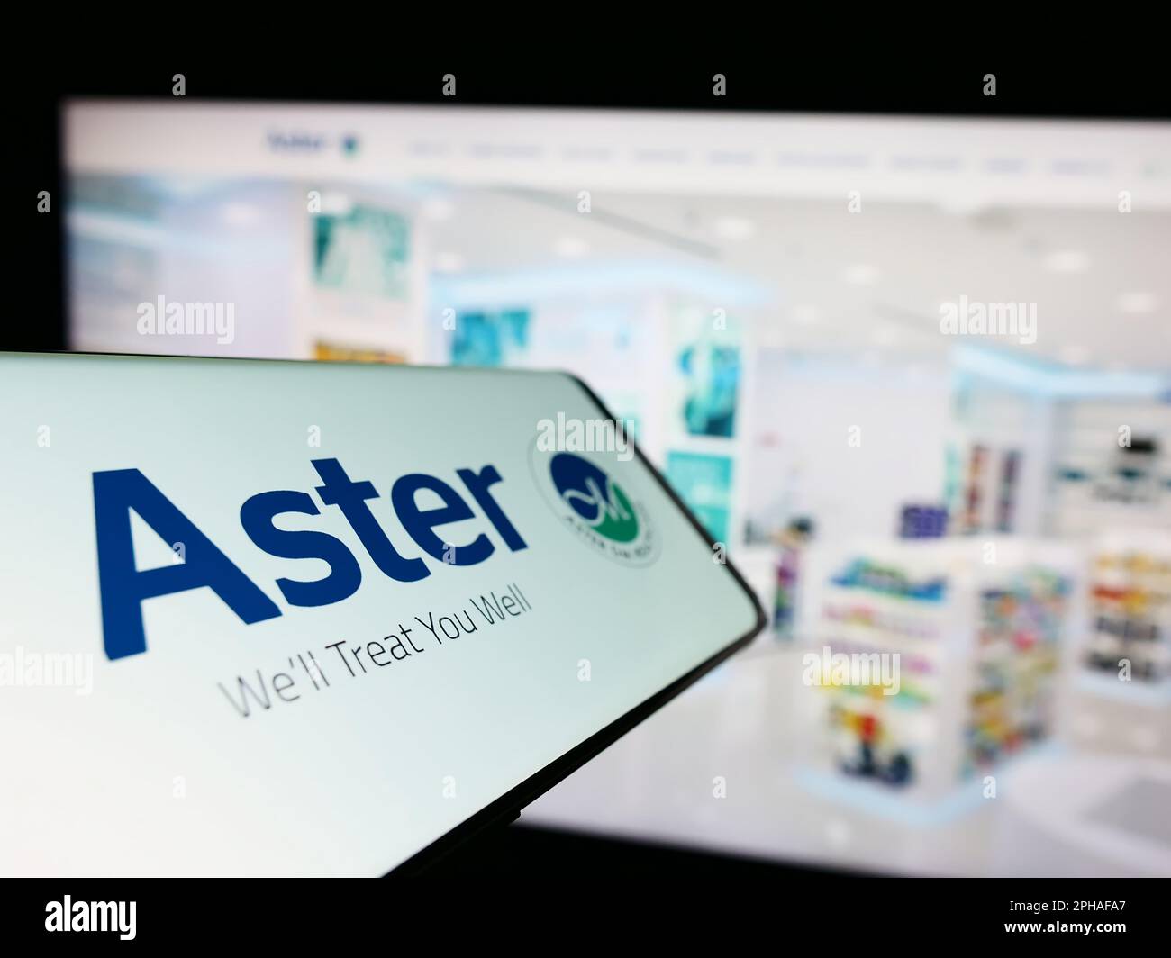 Mobile phone with logo of health company Aster DM Healthcare Limited on ...