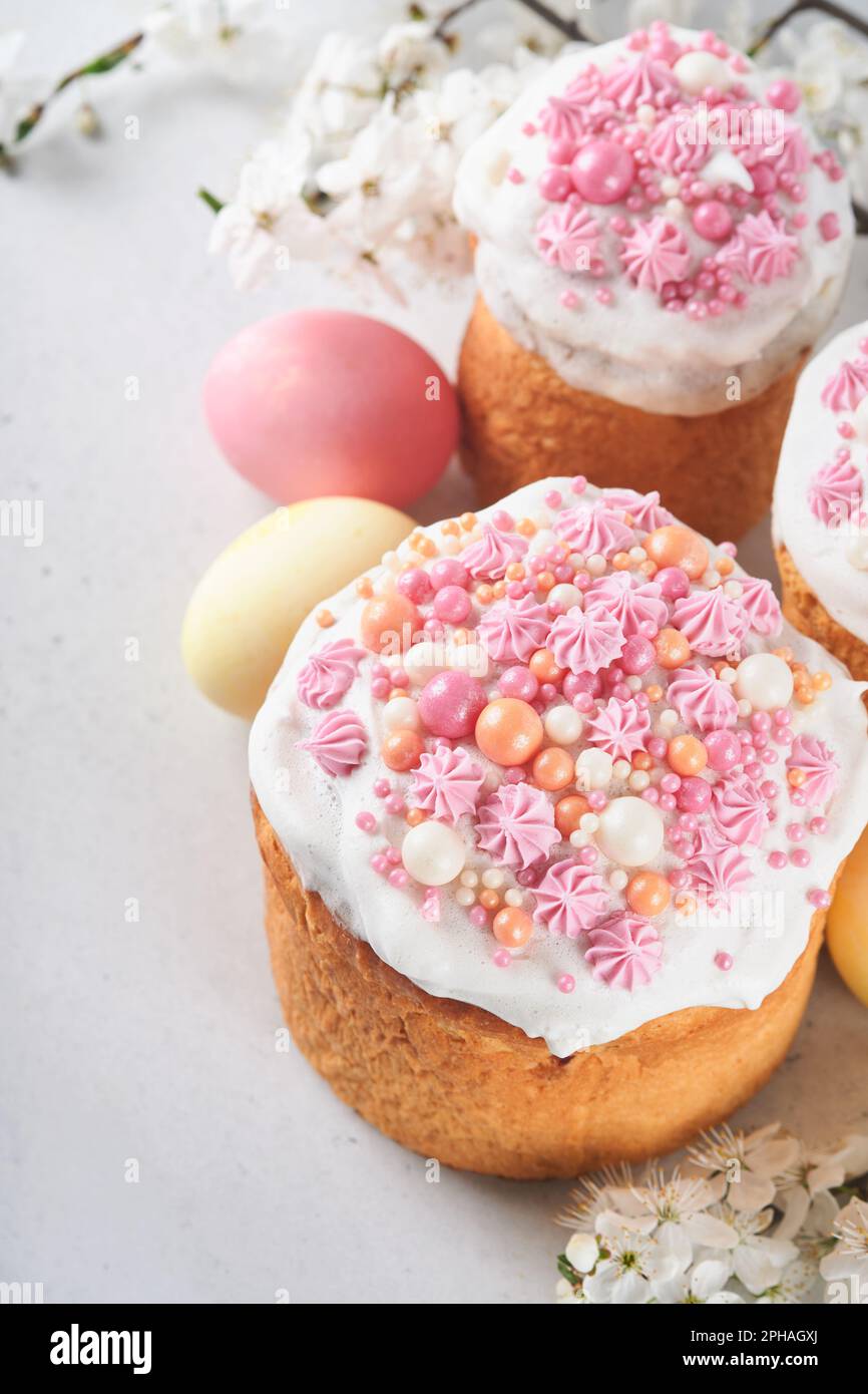 Traditional Easter sweet bread or cakes with white icing and sugar ...