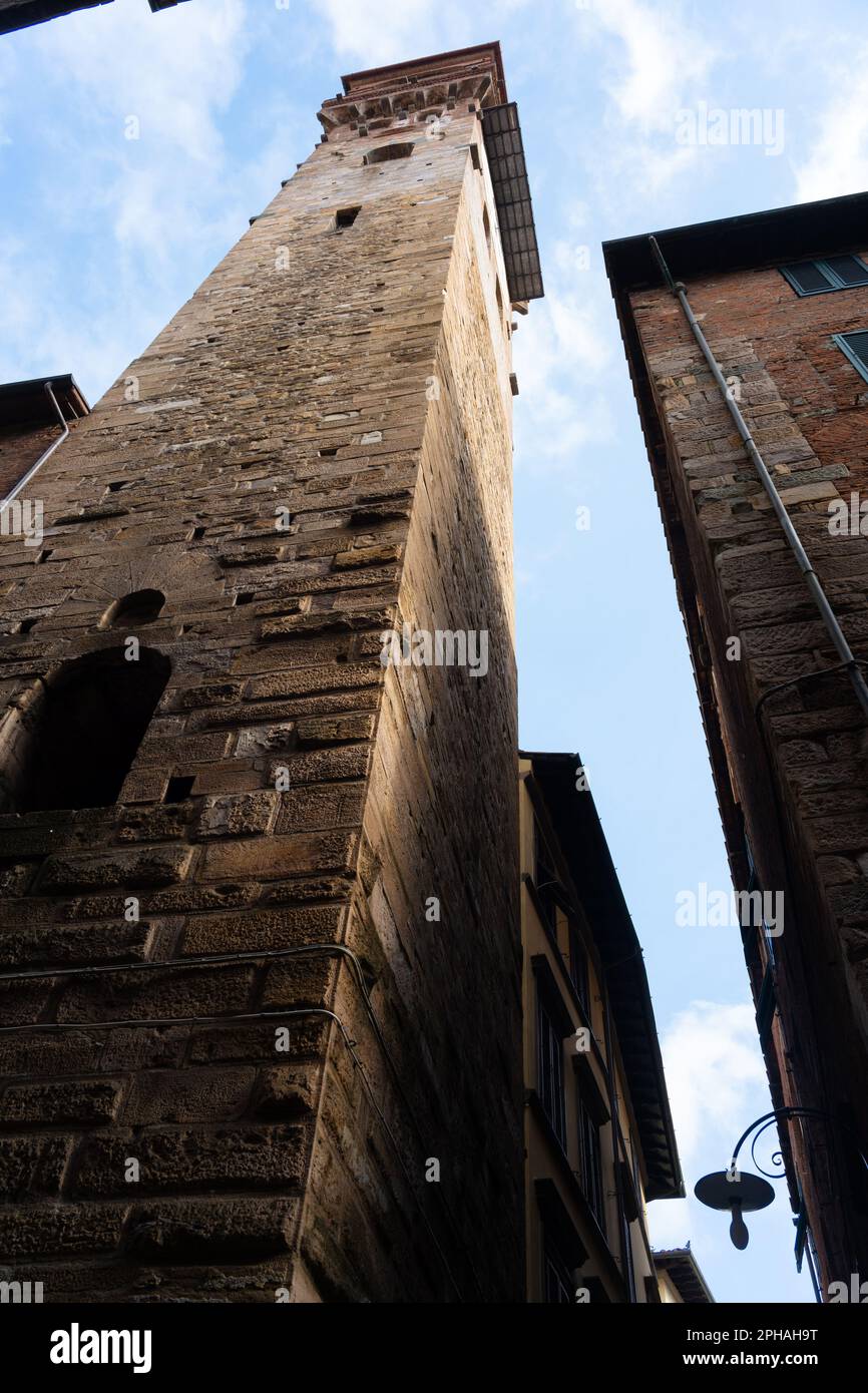 Torre delle Ore, the medieval clock tower, in the still-walled town of ...