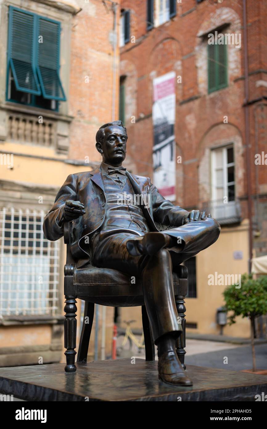 Statue of the composer Puccini in the still-walled town of Lucca in ...