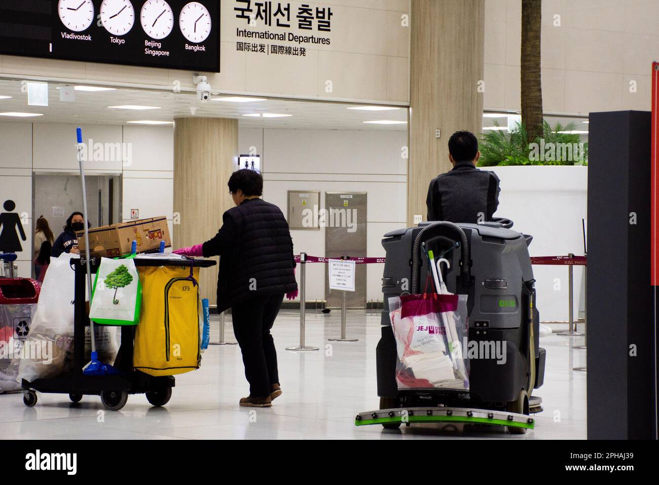Korean worker and cleaner officer operator people use driving machinery ...