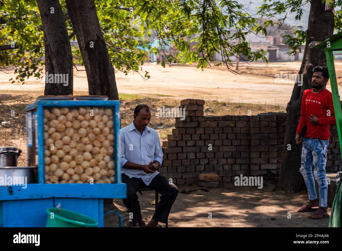 A phuchka seller in the street side stall. Sirka Jharkhand India South ...