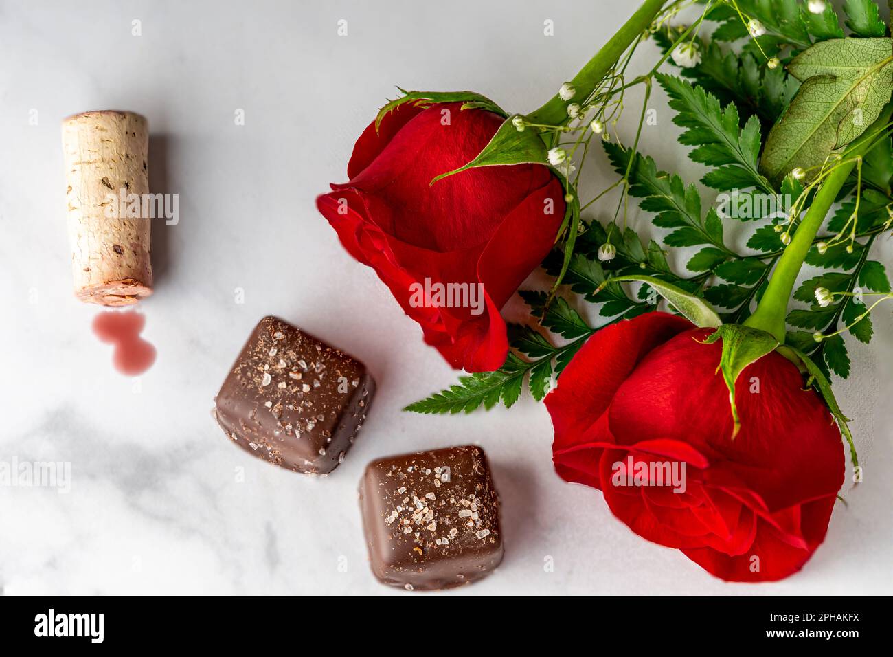 Background red roses wine glass hi-res stock photography and images - Alamy