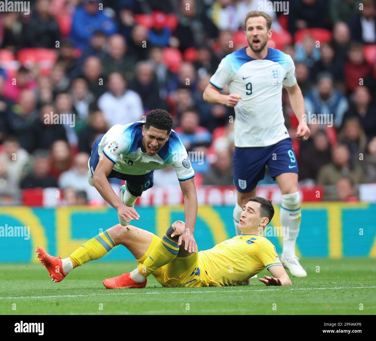 Jude Bellingham (Borussia Dortmund)of England gets tackled by Taras ...