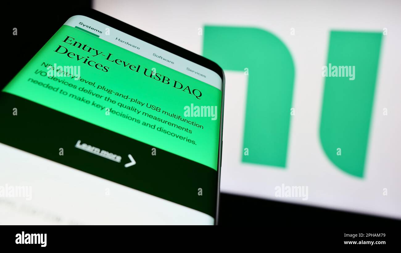 Mobile phone with webpage of company National Instruments Corporation ...