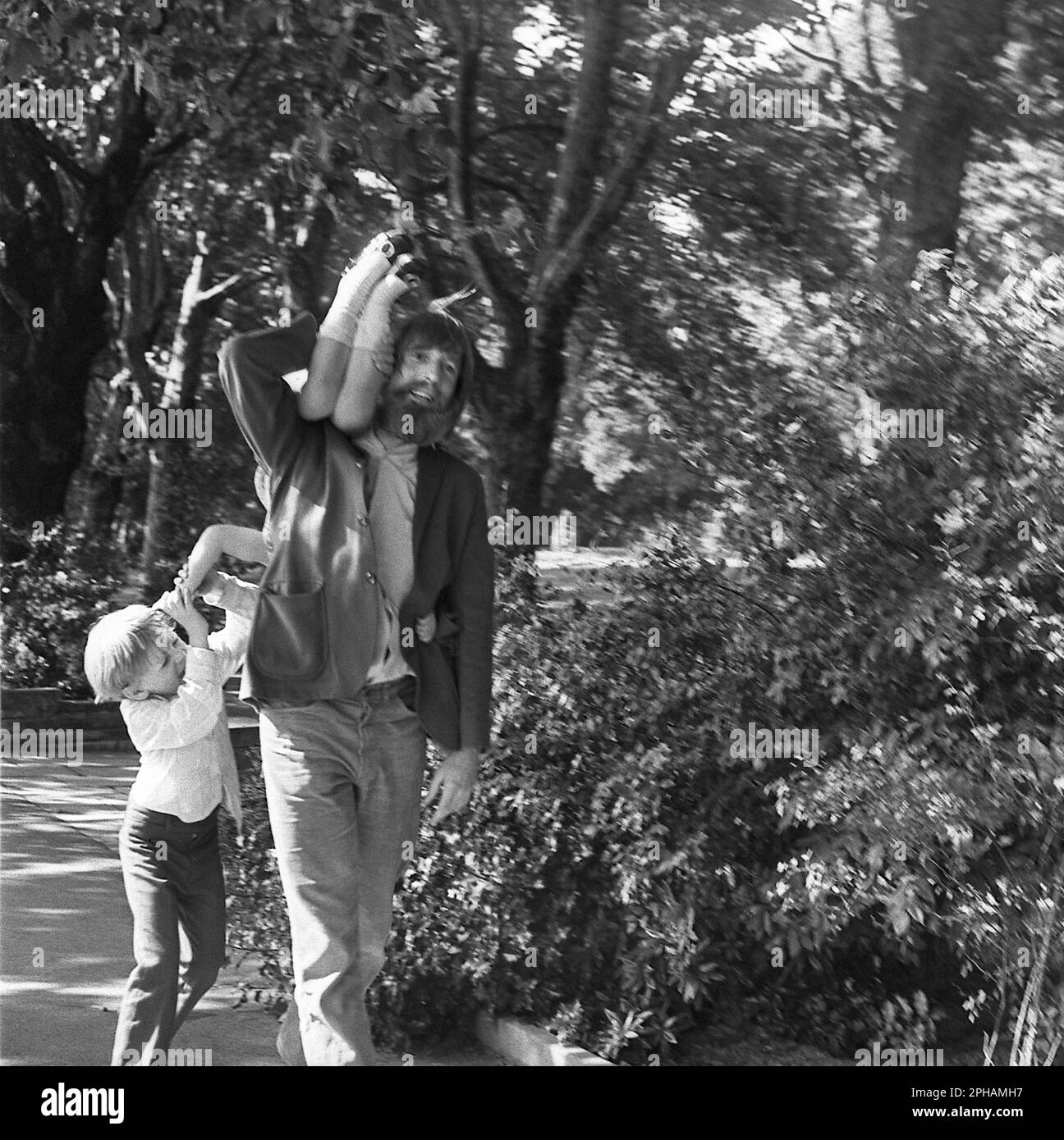 Children playing in air Black and White Stock Photos & Images - Alamy