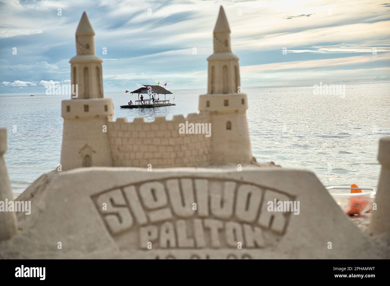 A detailed sand castle on the dreamlike idyllic beach of Siquijor in ...