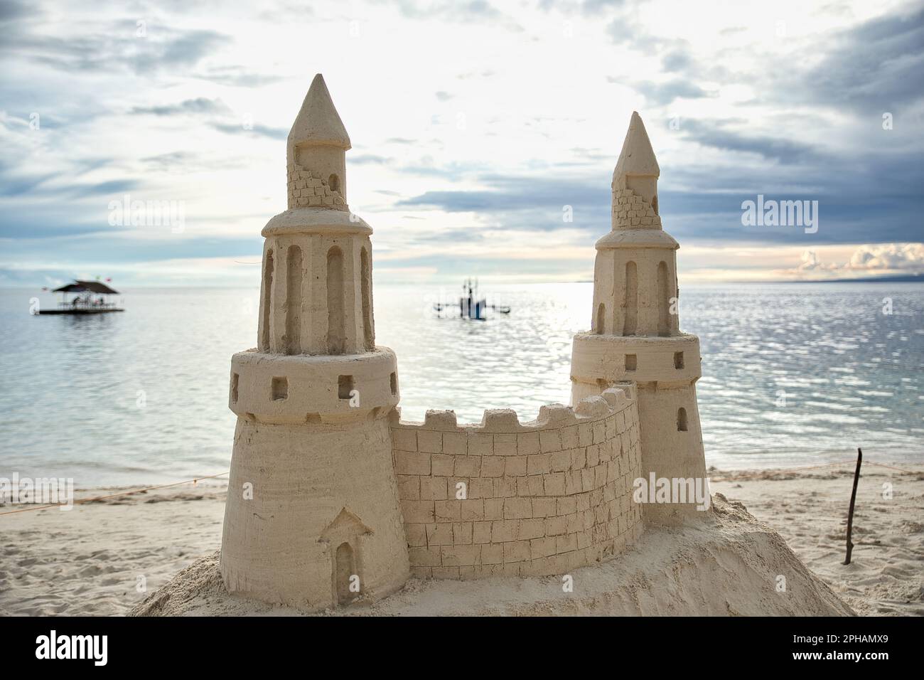 A detailed sand castle on the dreamlike idyllic beach of Siquijor in ...