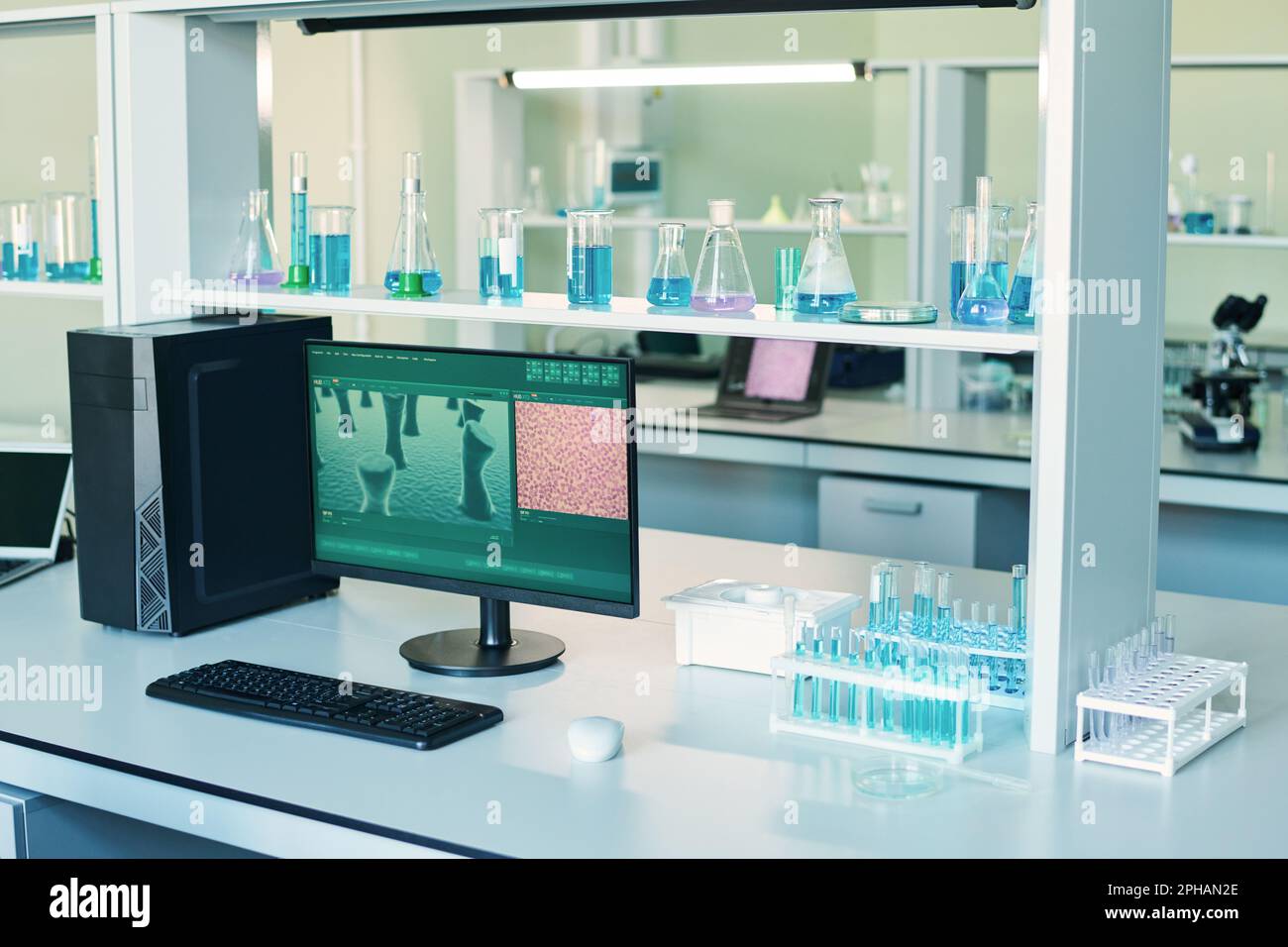 Workplace of virologist or biotechnologist with computer monitor on ...