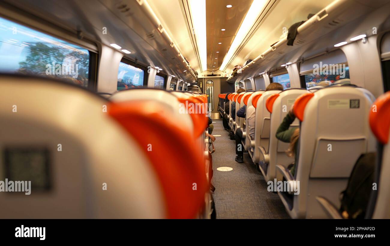 Back of train perspective interior highspeed transportation corridor ...
