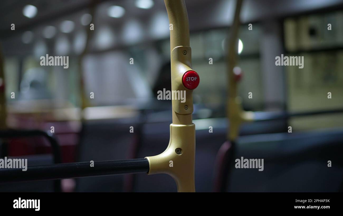 Closeup Stop button inside British bus interior of public ...