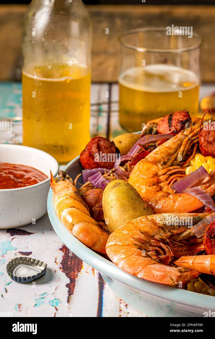 Boiled shrimp on a platter Southern US style. Low country boil. Close ...