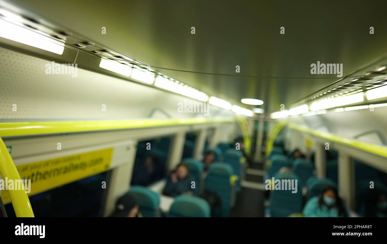 Train ceiling with defocused passenger traveling underground ...