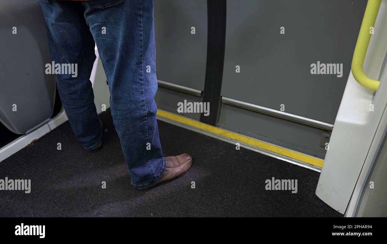 Person legs waiting by subway door in underground transportation ...