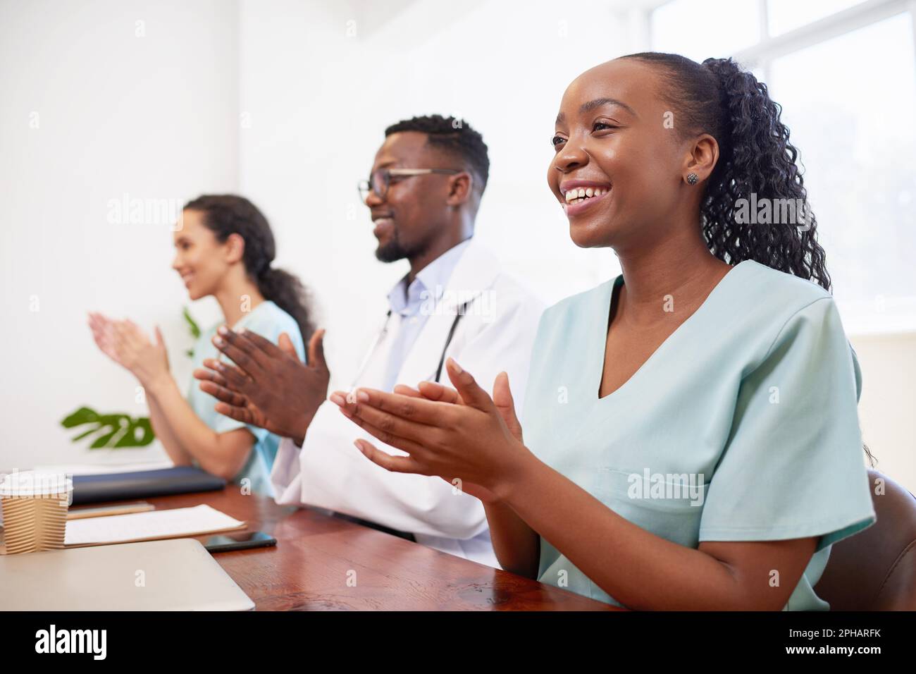 Young ethnic medical team success hi-res stock photography and images ...