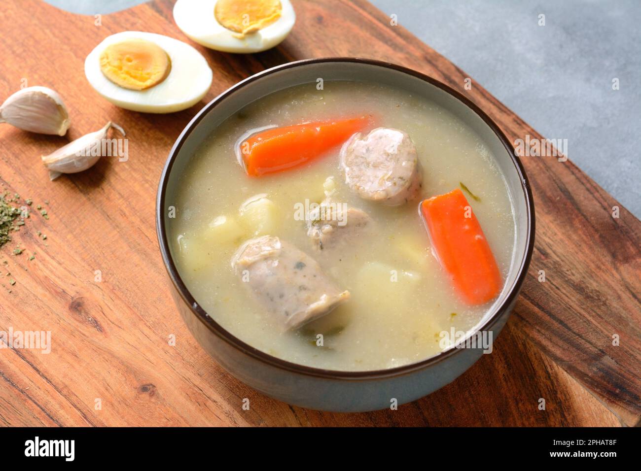 The sour soup (zurek) made of rye flour with sausage and egg. Popular ...