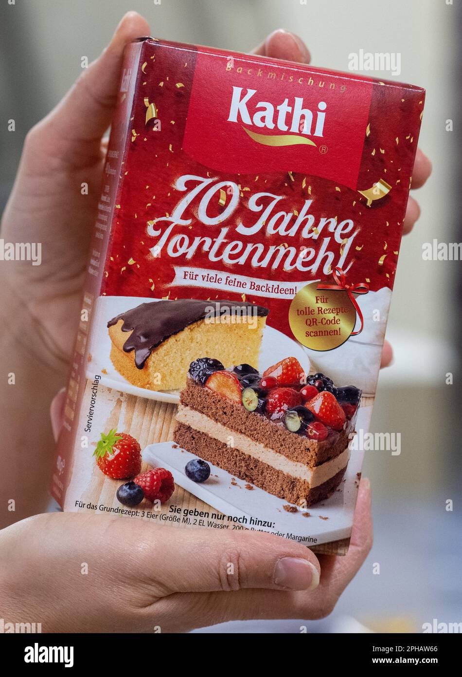 27 March 2023, Saxony-Anhalt, Halle (Saale): An employee of Kathi ...