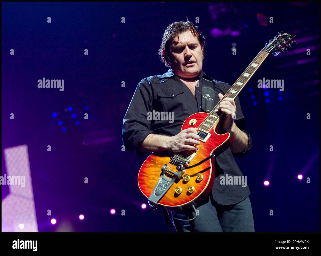 Charlie Burchill of the Simple Minds in concert in the Gelredome during ...